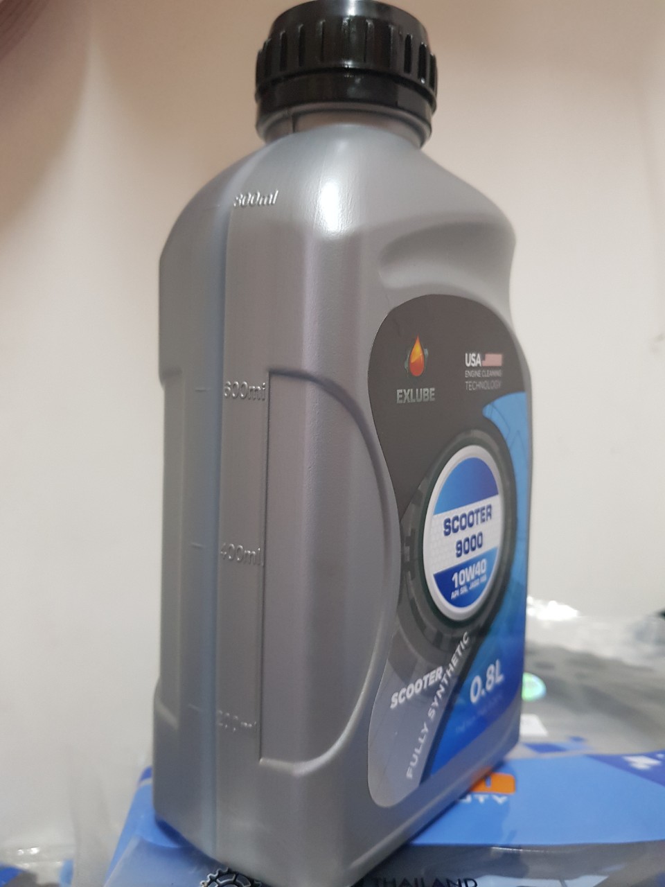 Nhớt Ex.lube ultra xe tay ga 10W40 tổng hợp total 100 chai 800ml nhớt Ex.lube 10W40 cho xe tay ...